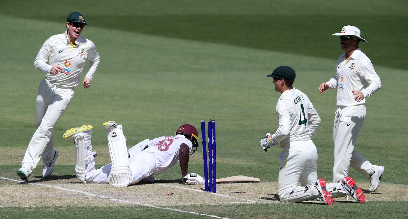 A confident Steven Smith watches Anderson Phillip get run out ...