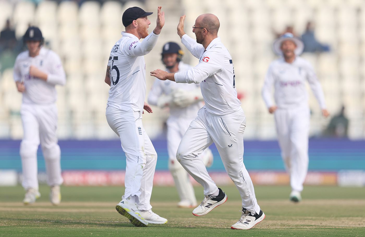 Jack Leach and Ben Stokes celebrate the wicket of Saud Shakeel ...