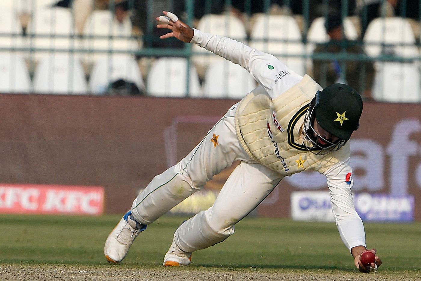 Abdullah Shafique took a stunning short leg catch to dismiss Joe Root ...