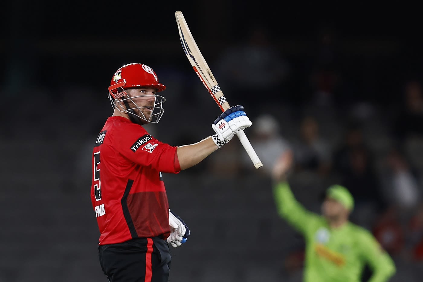Aaron Finch raises his bat after reaching fifty | ESPNcricinfo.com