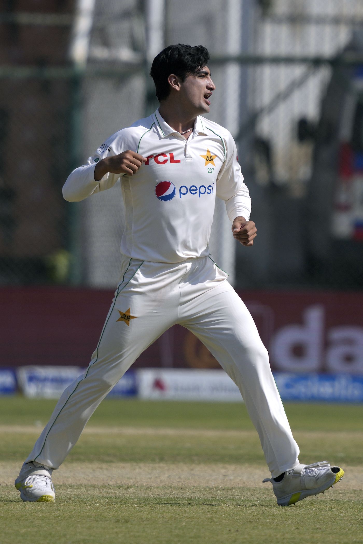 Naseem Shah celebrates after taking the first wicket of the match ...