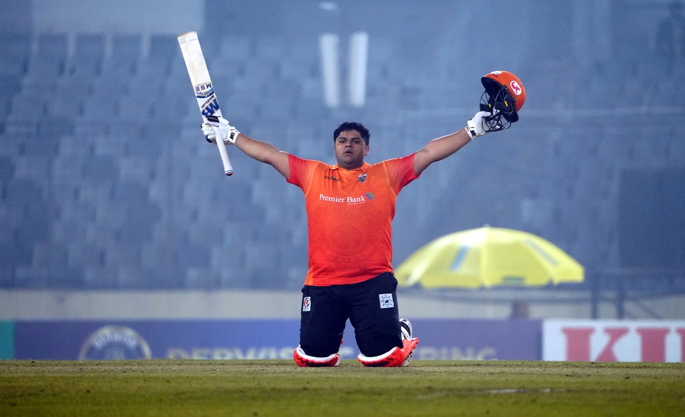 Azam Khan celebrates after reaching his maiden T20 century ...