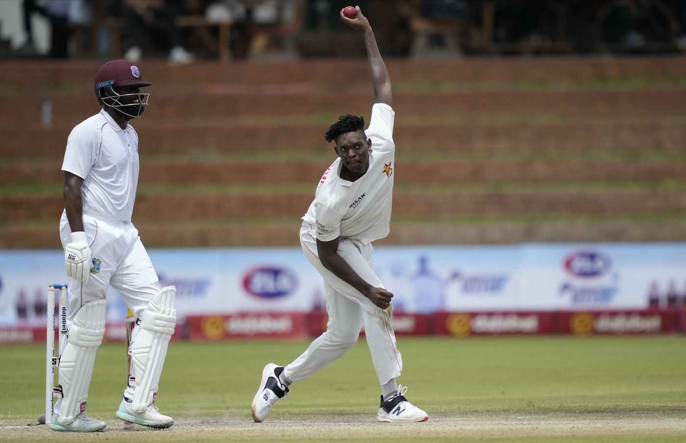 Richard Ngarava bowls as Raymon Reifer watches | ESPNcricinfo.com