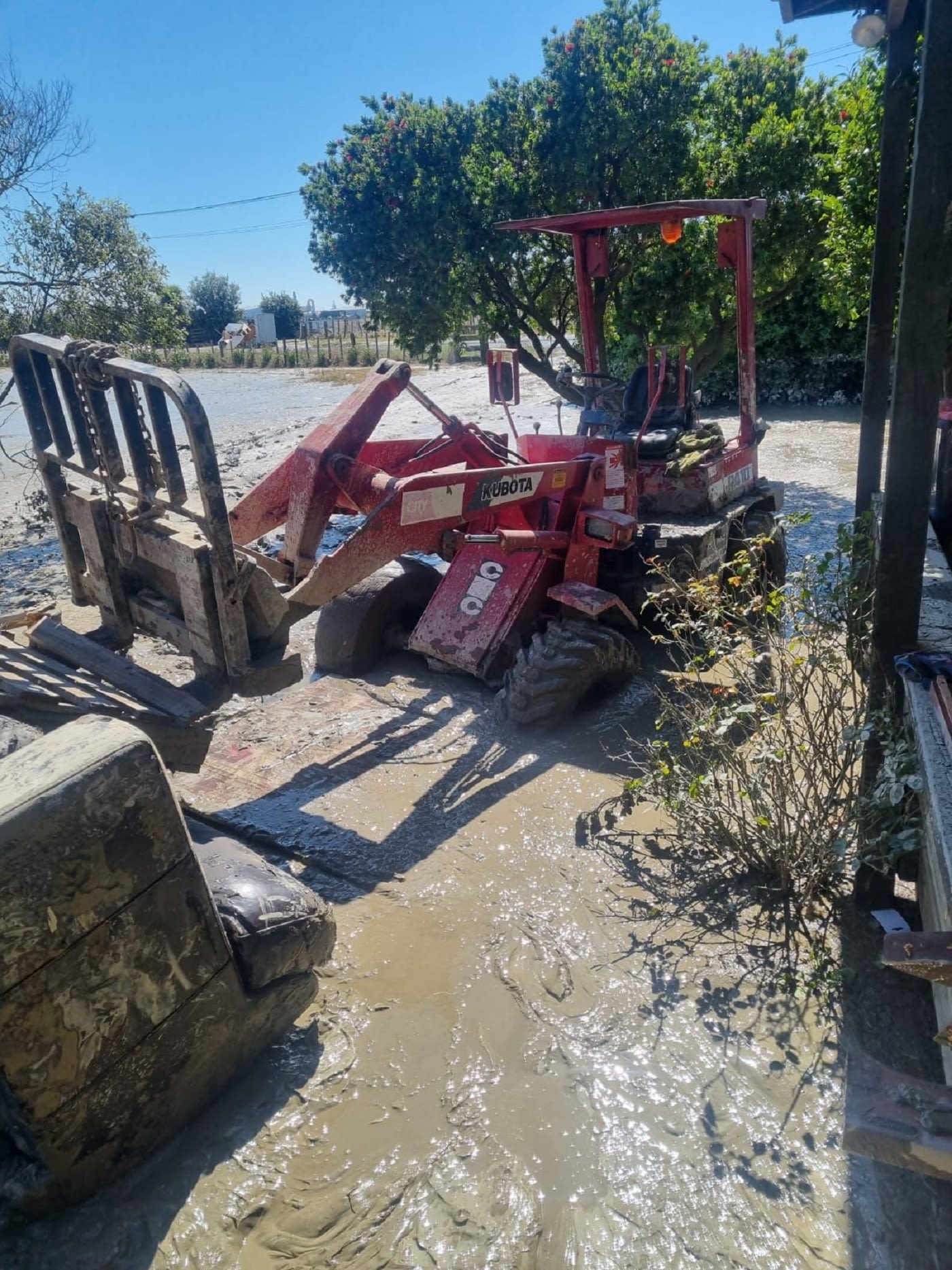 The bulldozer was in business after the damage caused by the cyclone ...
