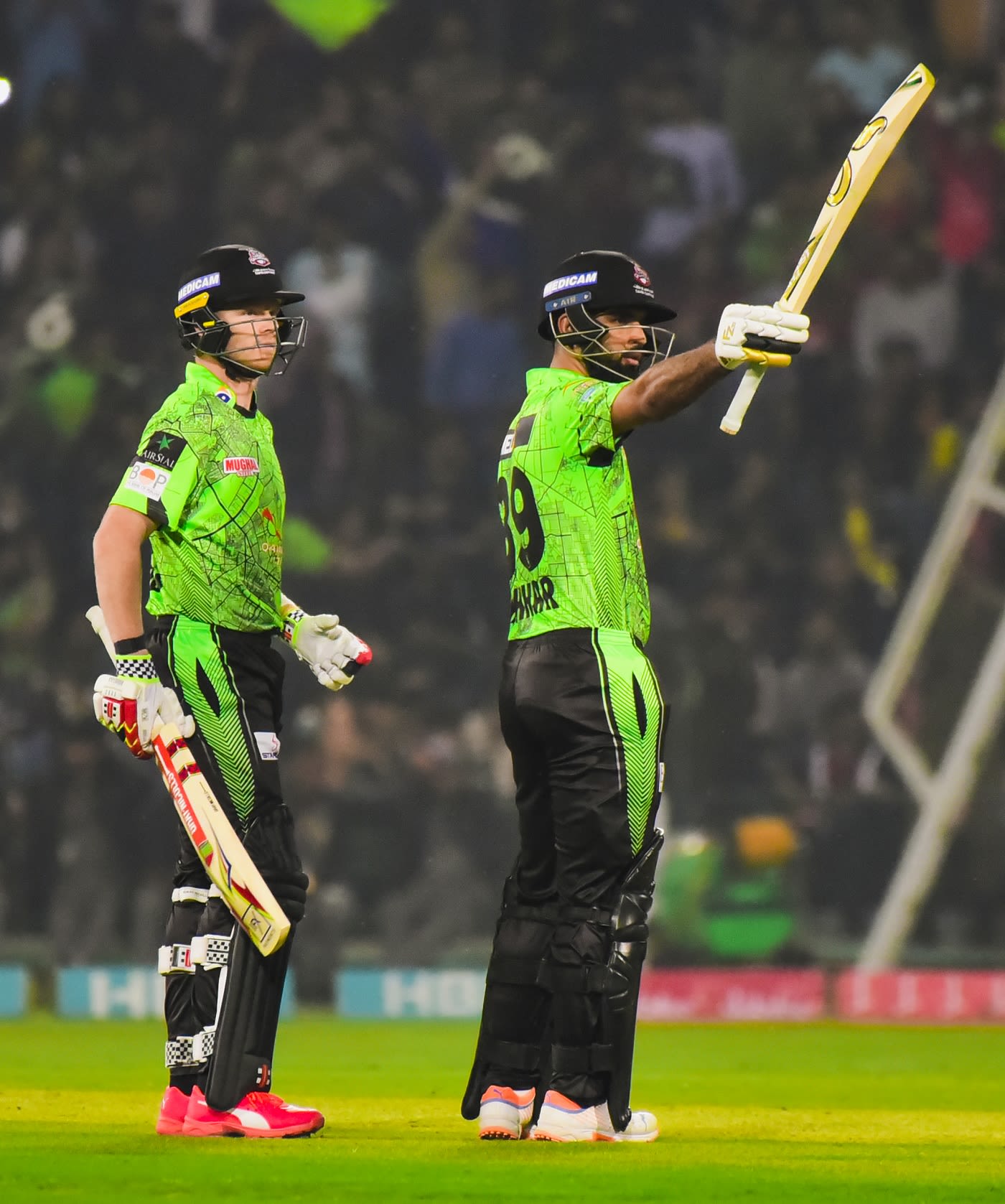 Fakhar Zaman raises his bat after reaching his fifty | ESPNcricinfo.com