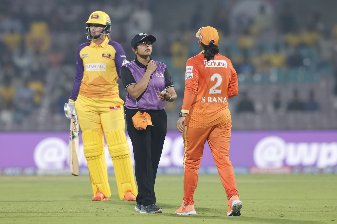 Umpire Gayathri Venugopalan talks to Sneh Rana after Gujarat Giants ...