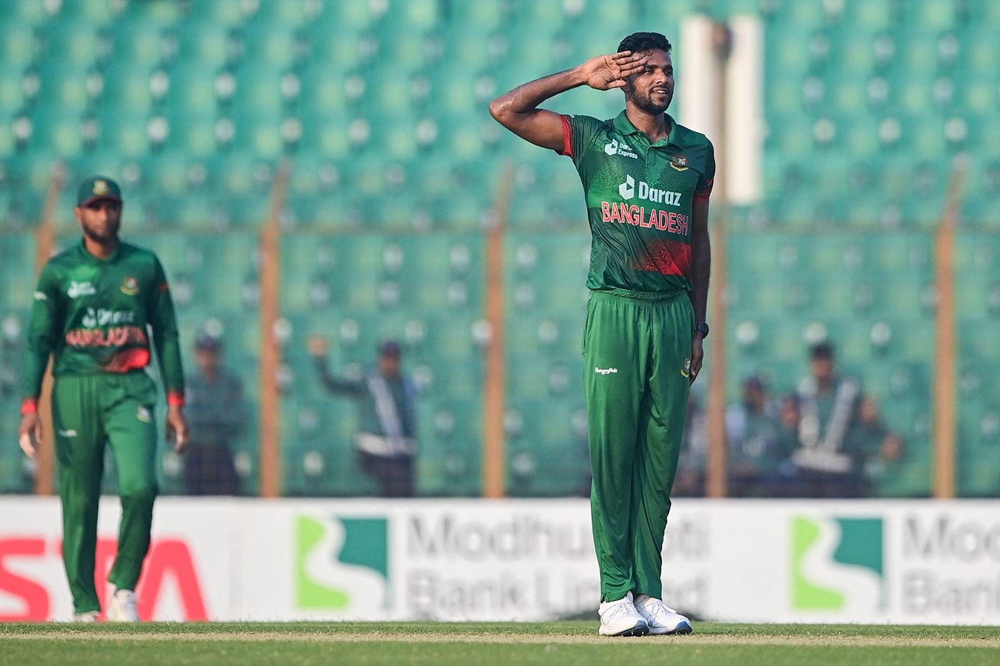 Ebadot Hossain salutes the wicket of Dawid Malan | ESPNcricinfo.com
