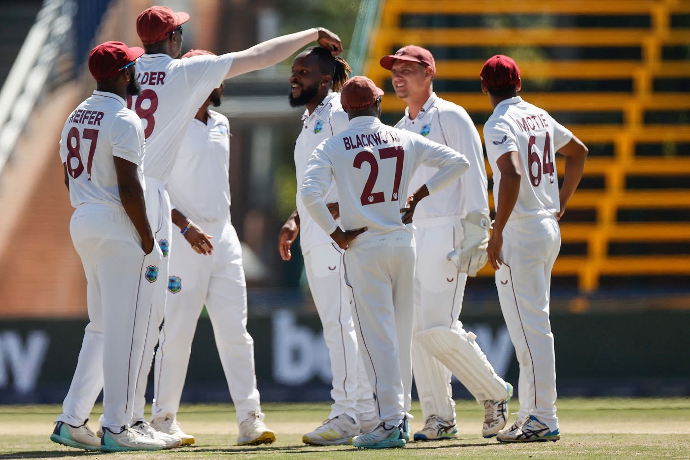 Kyle Mayers is mobbed by his team-mates | ESPNcricinfo.com