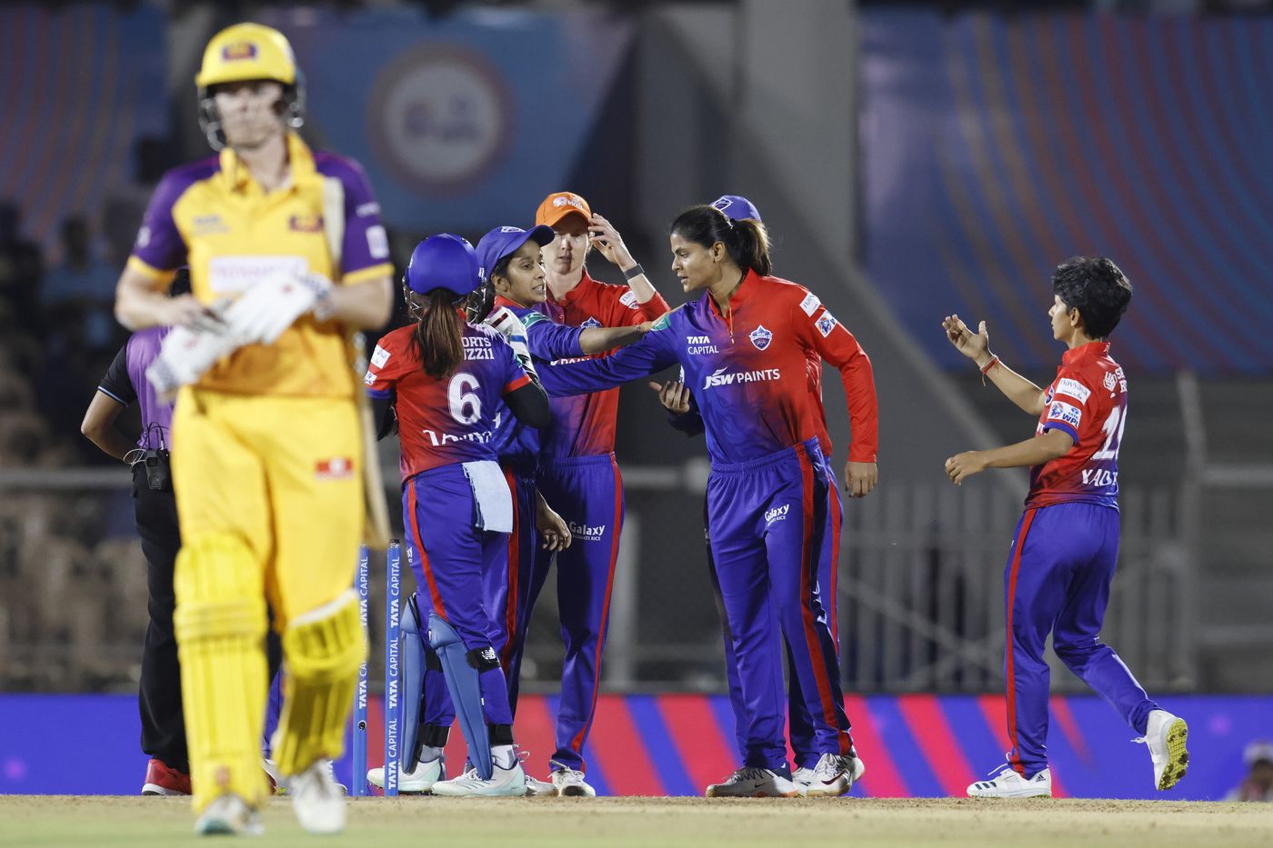 Radha Yadav And Her Team Mates Celebrate The Wicket Of Simran Shaikh