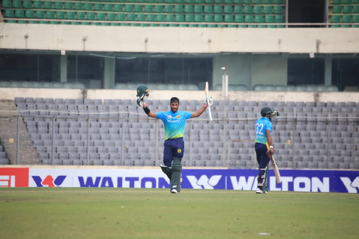 Mohammad Naim celebrates his century | ESPNcricinfo.com