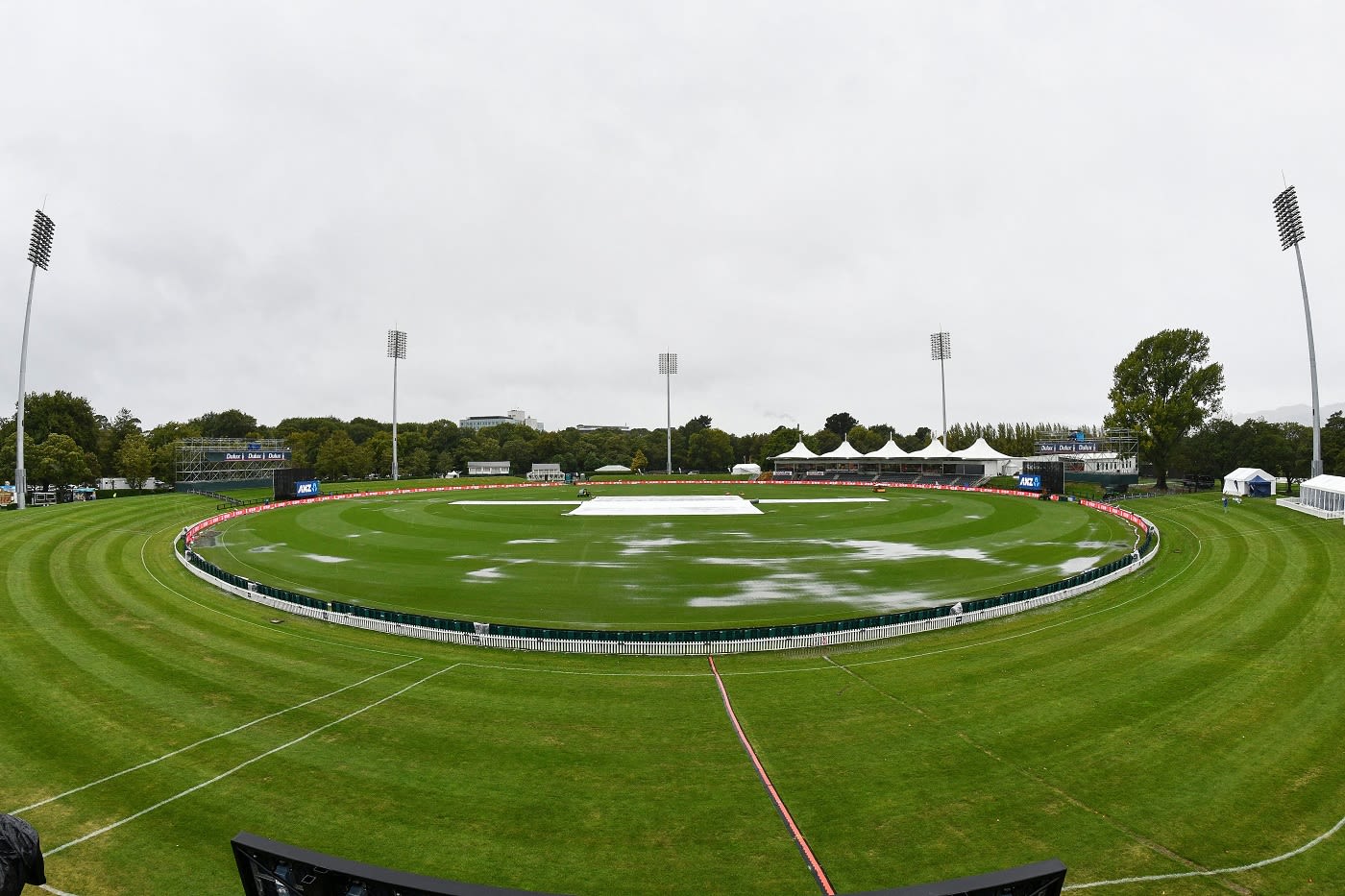 Puddles form on the outfield due to persistent rain at the Hagley Oval ...
