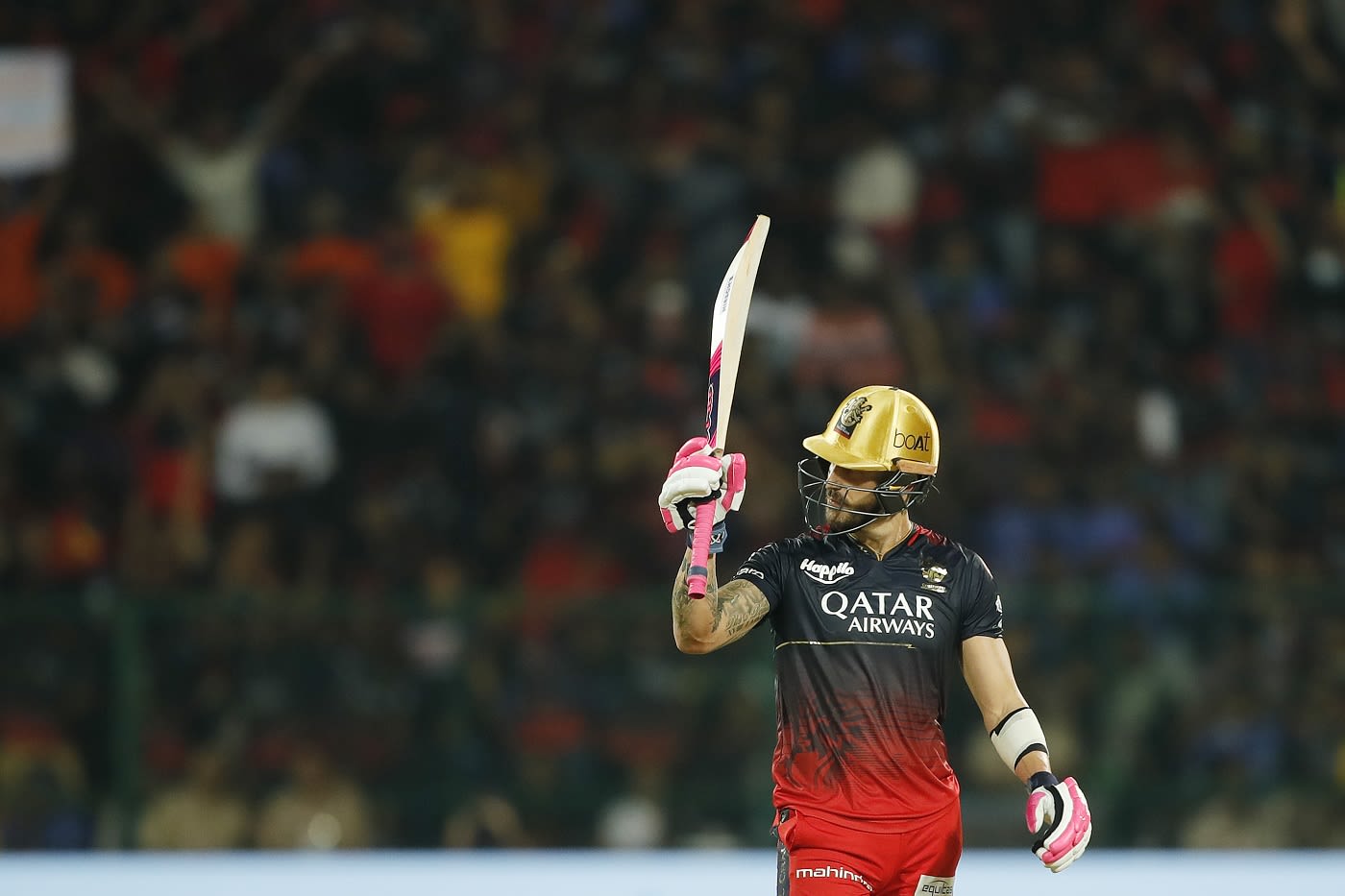 Faf du Plessis raises his bat after his half-century | ESPNcricinfo.com