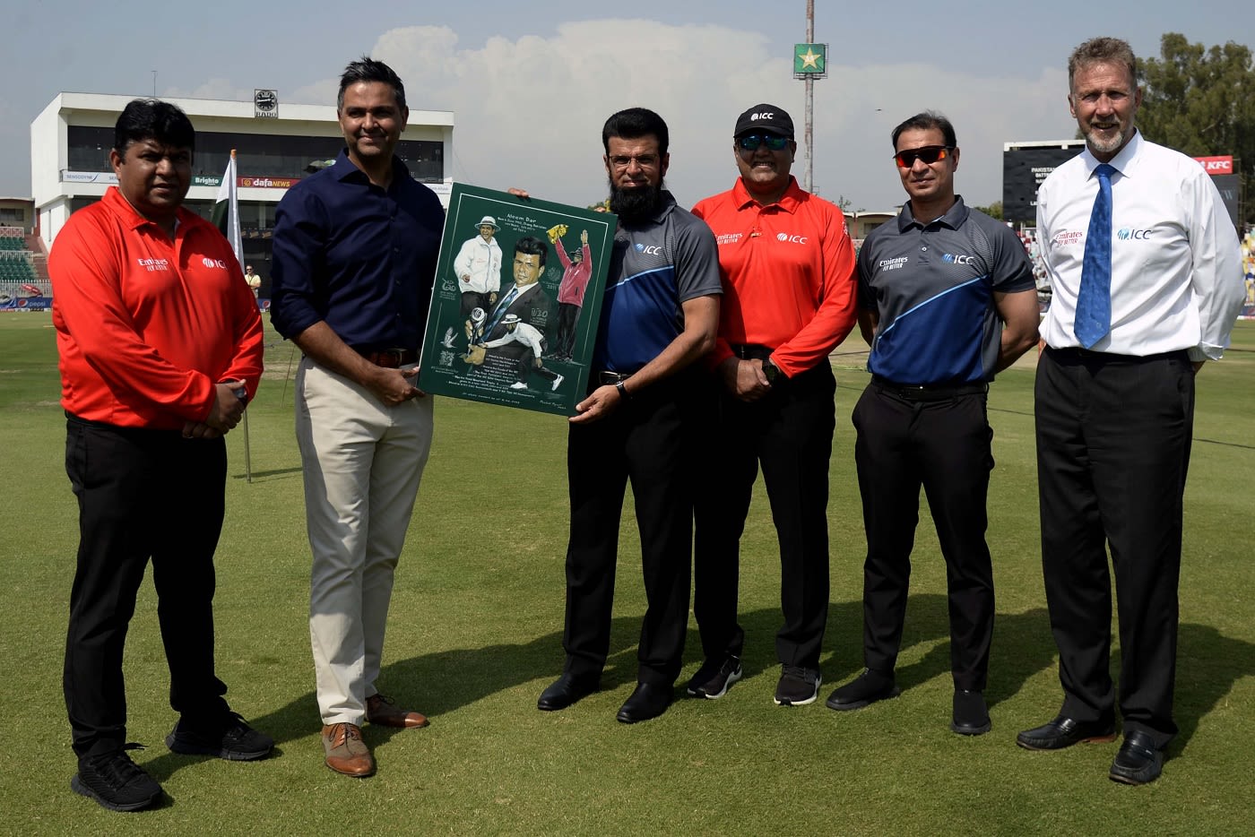 Aleem Dar is honoured by the ICC General Manager Wasim Khan on the day ...