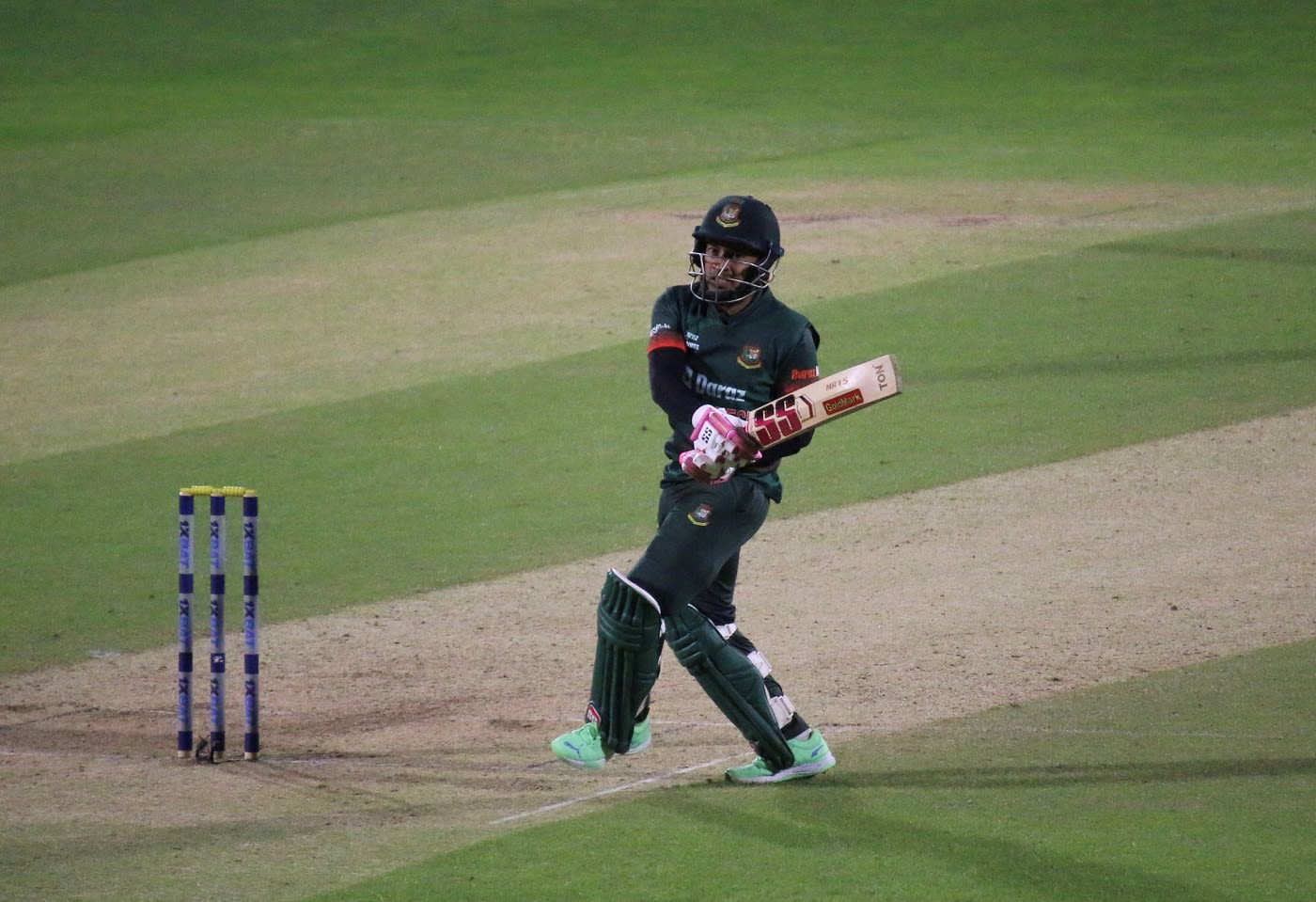 Mushfiqur Rahim scoops it over the wicketkeeper's head for the the ...
