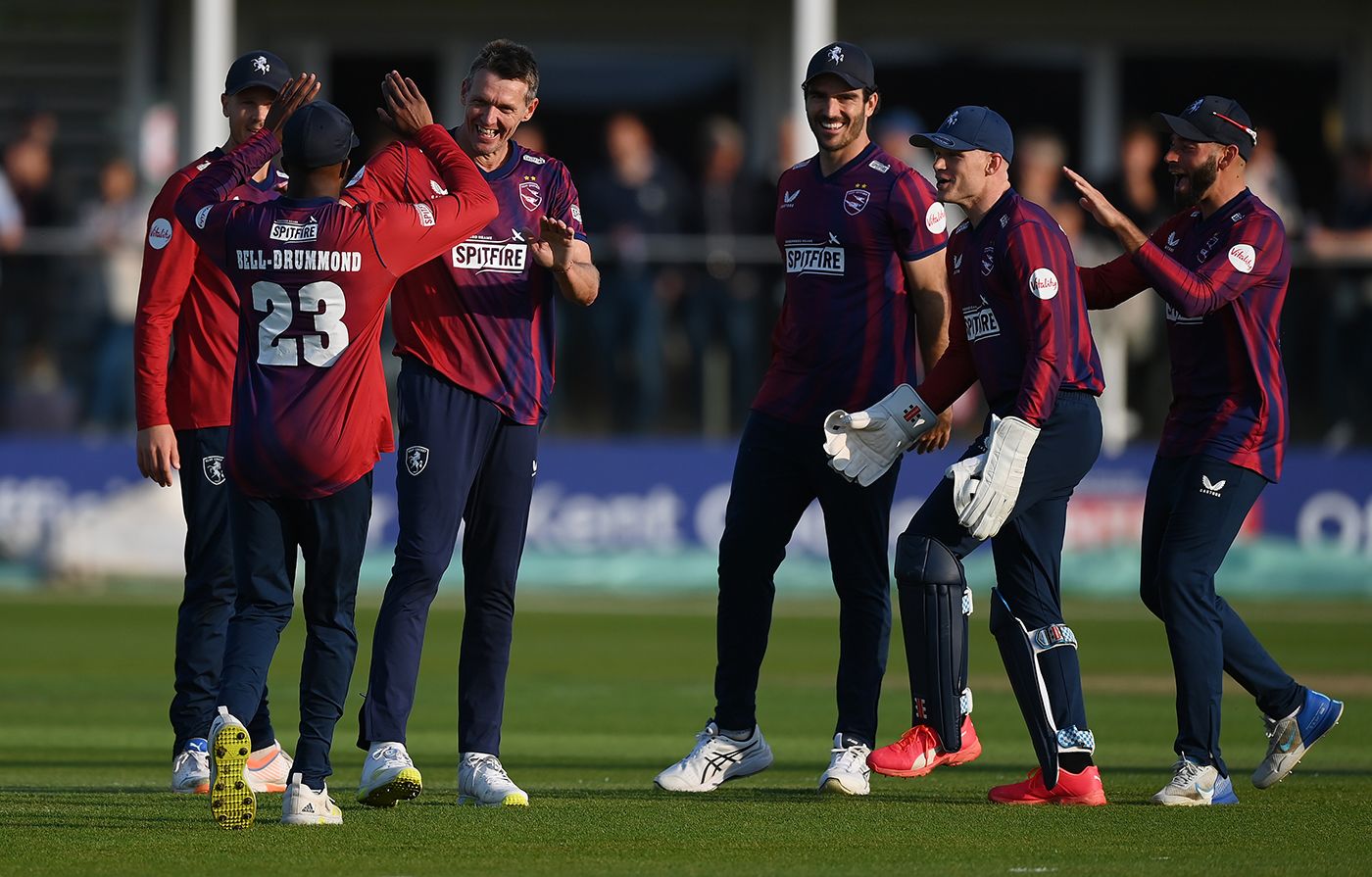 Michael Hogan celebrates with team-mates after taking the wicket of ...