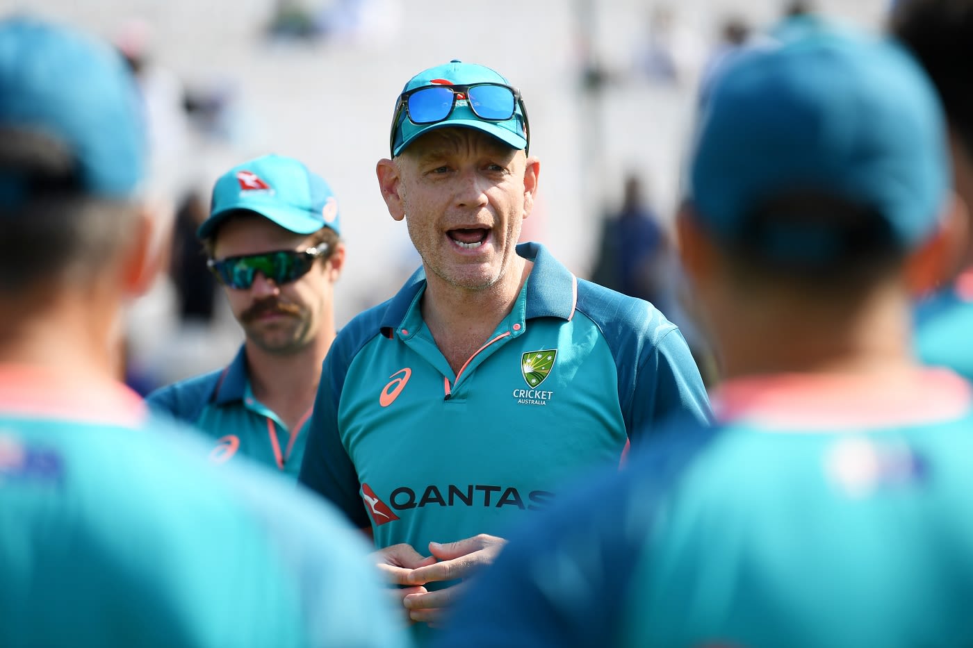 Head coach Andrew McDonald does the talking in the Australian huddle ...