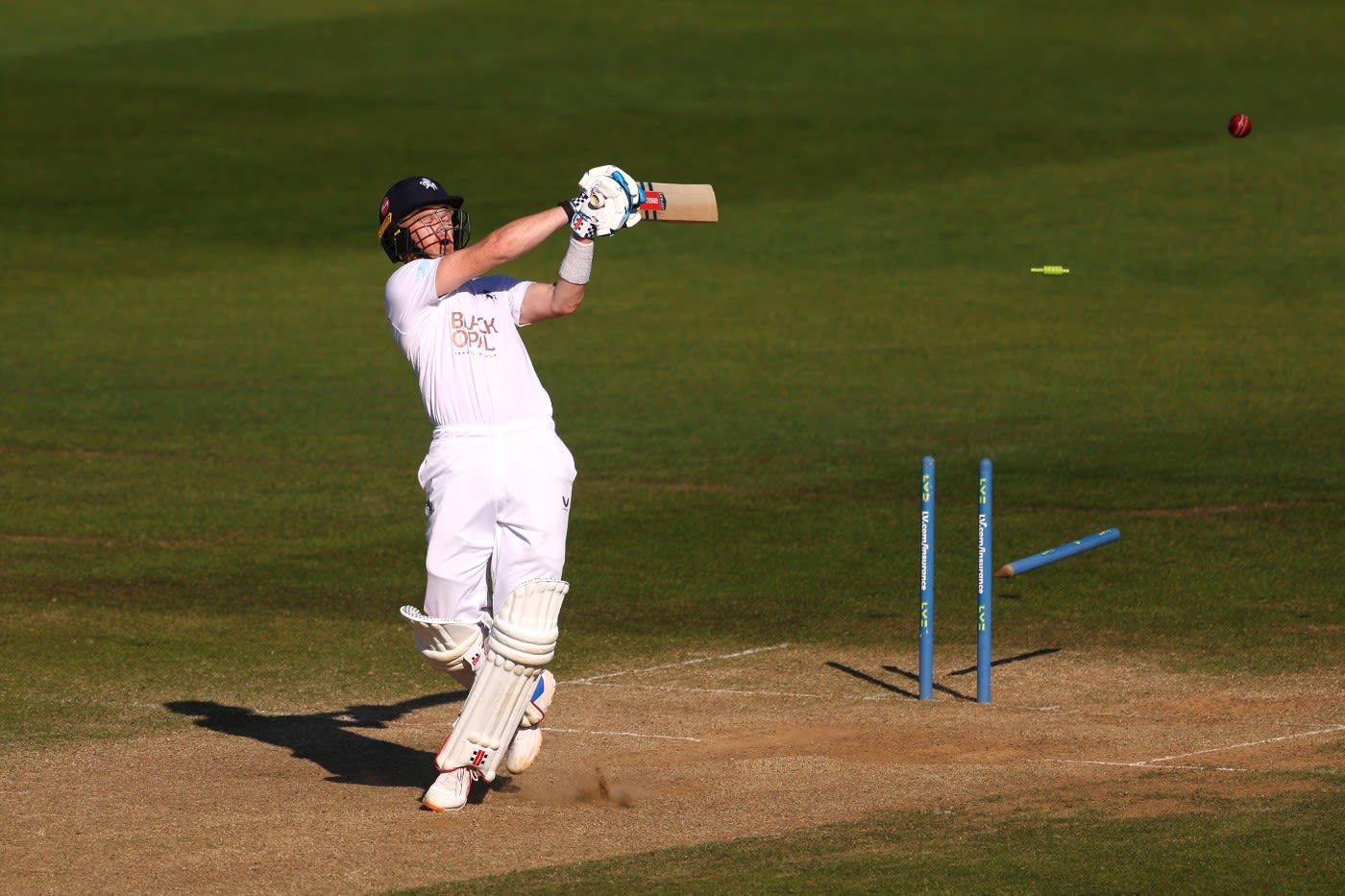 Sam Billings swings across the line and loses his middle stump ...