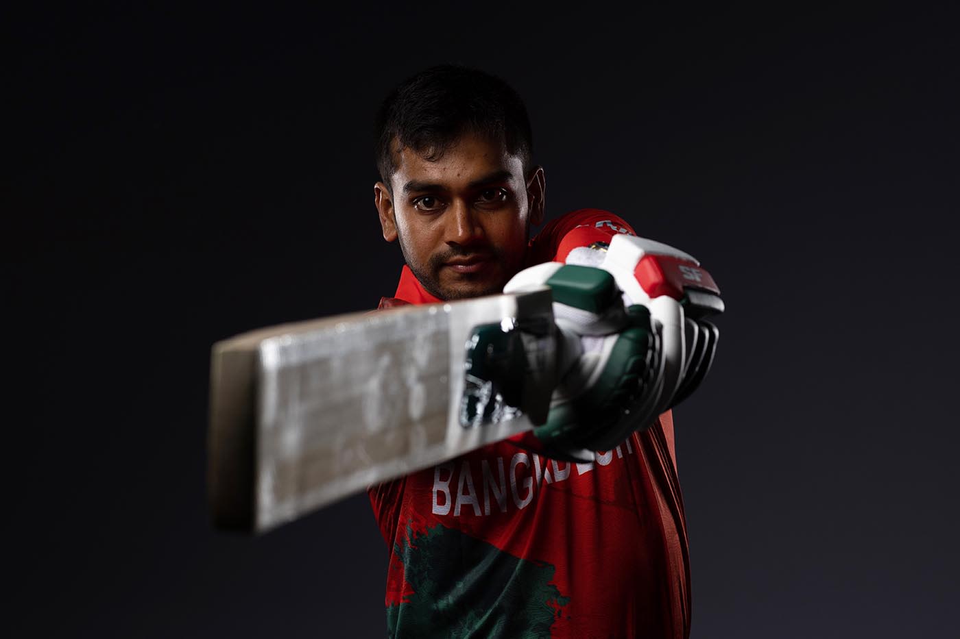 Mehidy Hasan poses with a bat | ESPNcricinfo.com