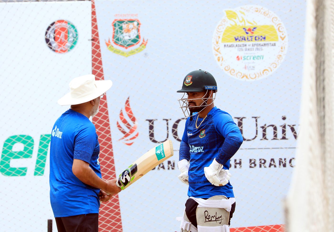 Litton Das gets some batting tips from Chandika Hathurusinghe ...