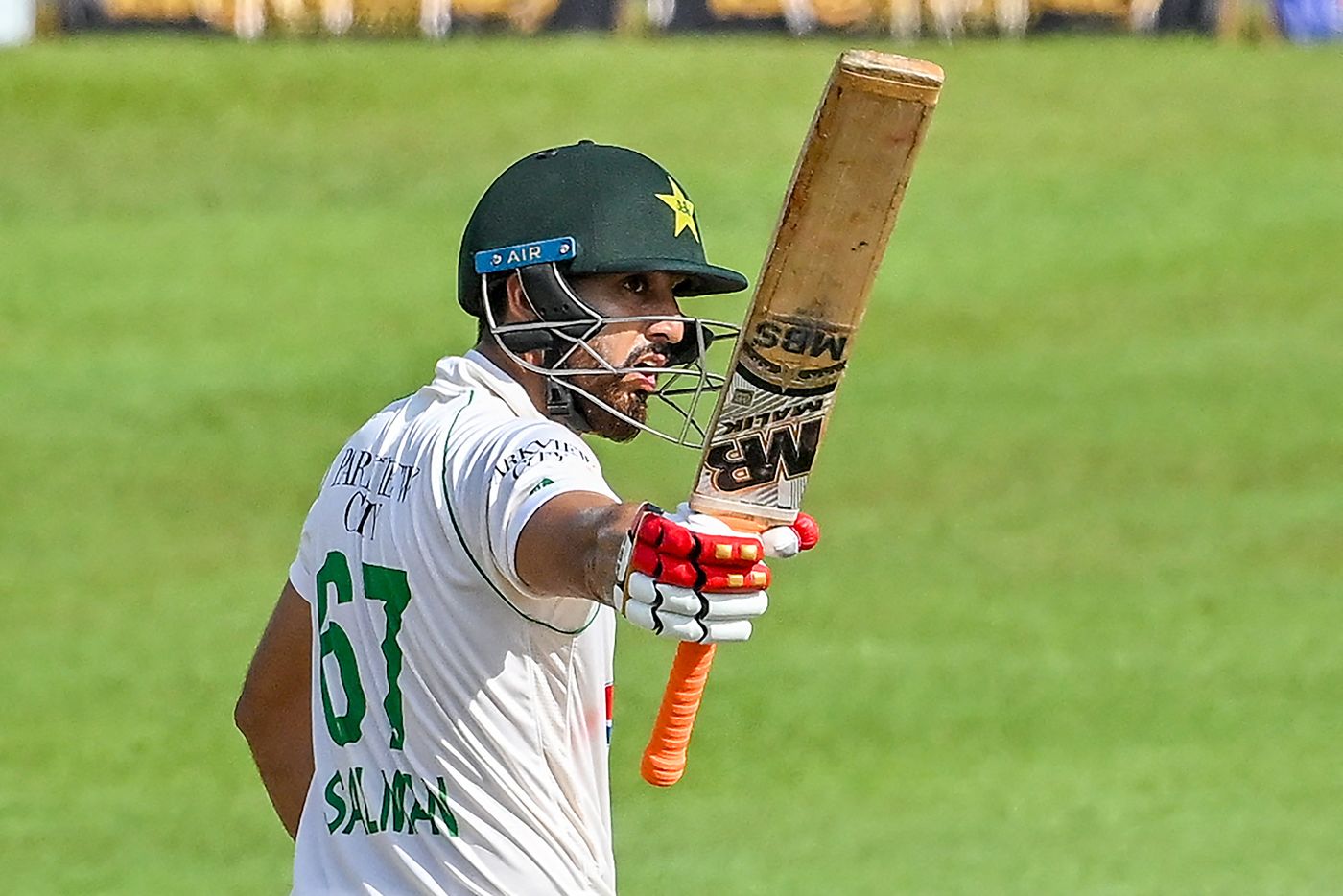 Agha Salman soaks in the applause on getting to 100 off 123 balls ...