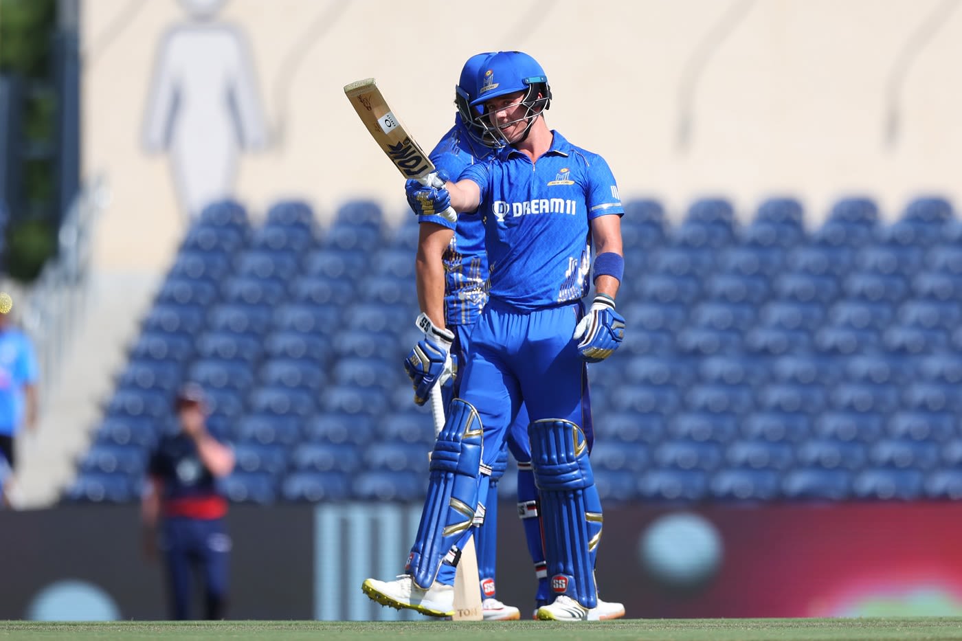 Devald Brewis celebrates his half-century | ESPNcricinfo.com