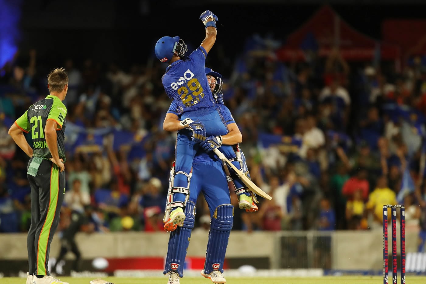 Nicholas Pooran and Tim David celebrate MI New York's title win ...