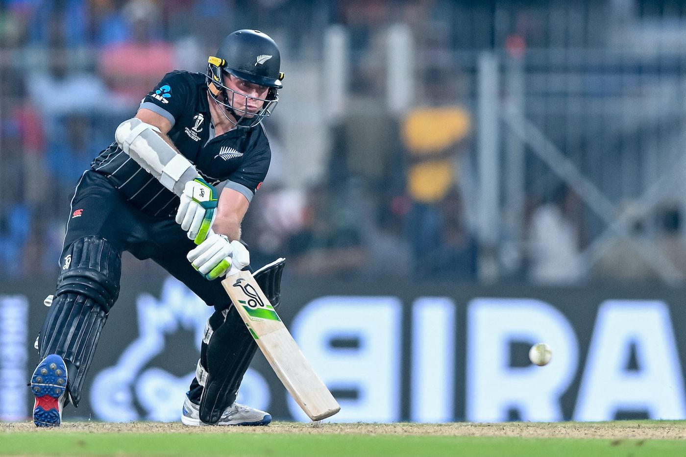 Tom Latham connected with a scoop before getting out to it ...