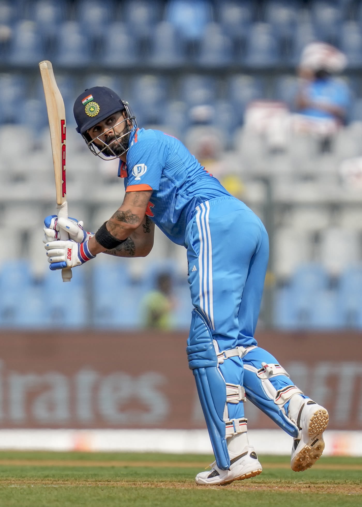 Virat Kohli got off the mark with a flick to the fine leg boundary ...