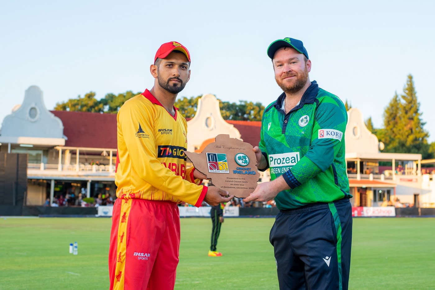 Captains Sikandar Raza and Paul Stirling pose with a memento ...