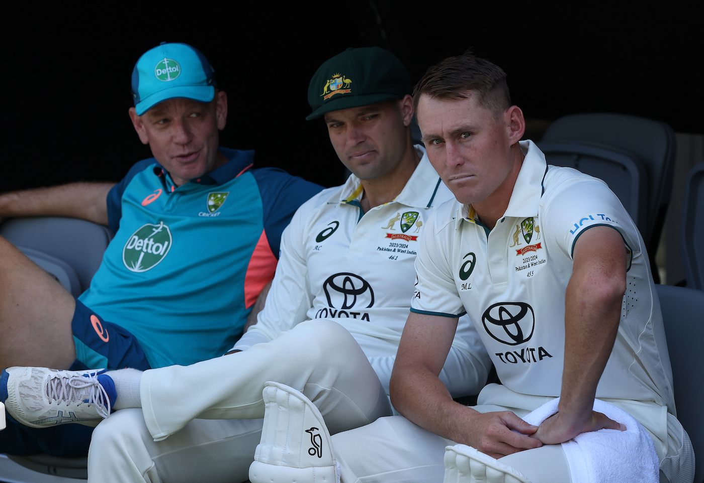 Marnus Labuschagne, Alex Carey and Andrew McDonald wait for play to ...