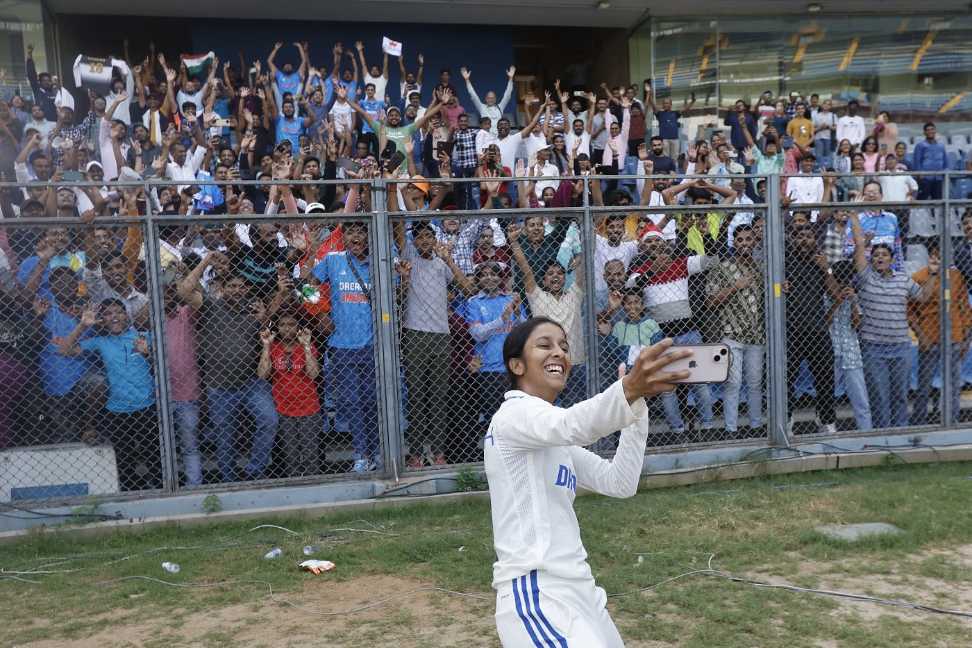 Jemimah Rodrigues poses for a selfie with fans after the game ...