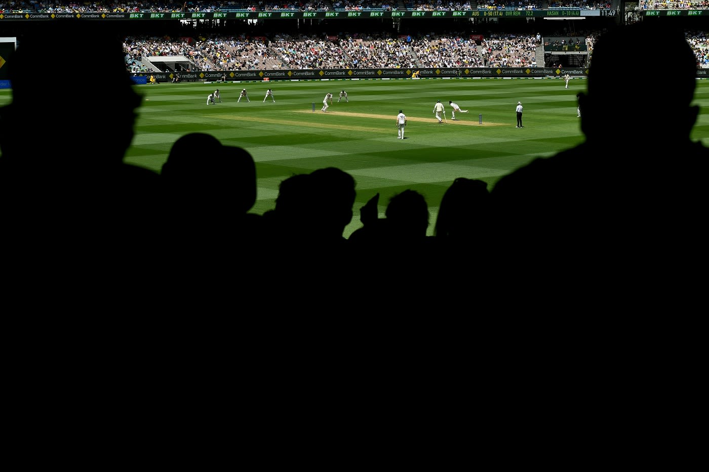 The view from one of the packed stands of the Melbourne Cricket Ground ...