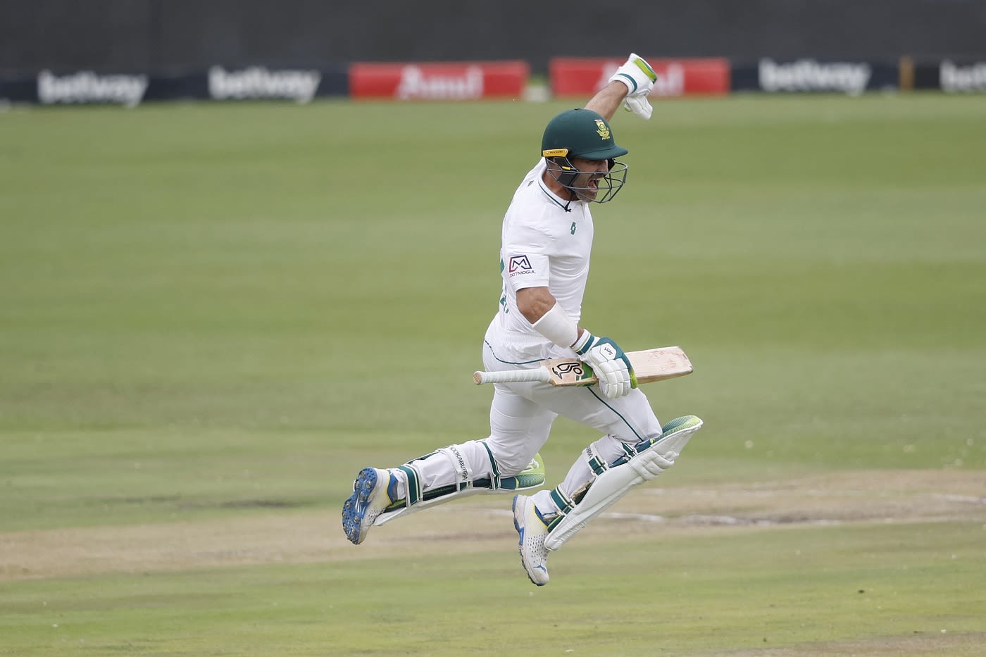Dean Elgar leaps in celebration after his century | ESPNcricinfo.com