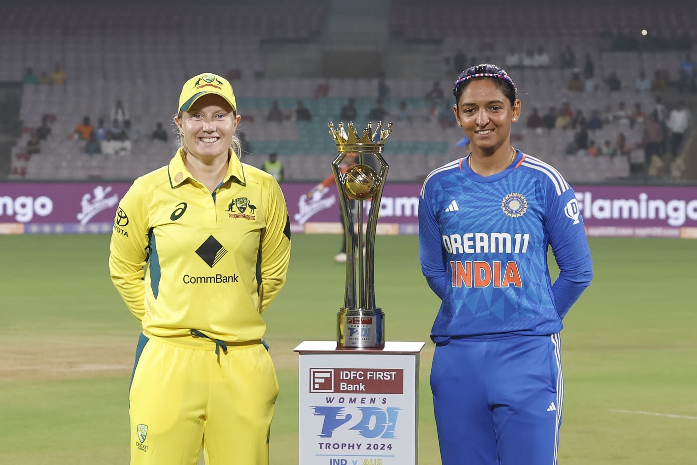 Alyssa Healy and Harmanpreet Kaur pose for the T20 trophy ...