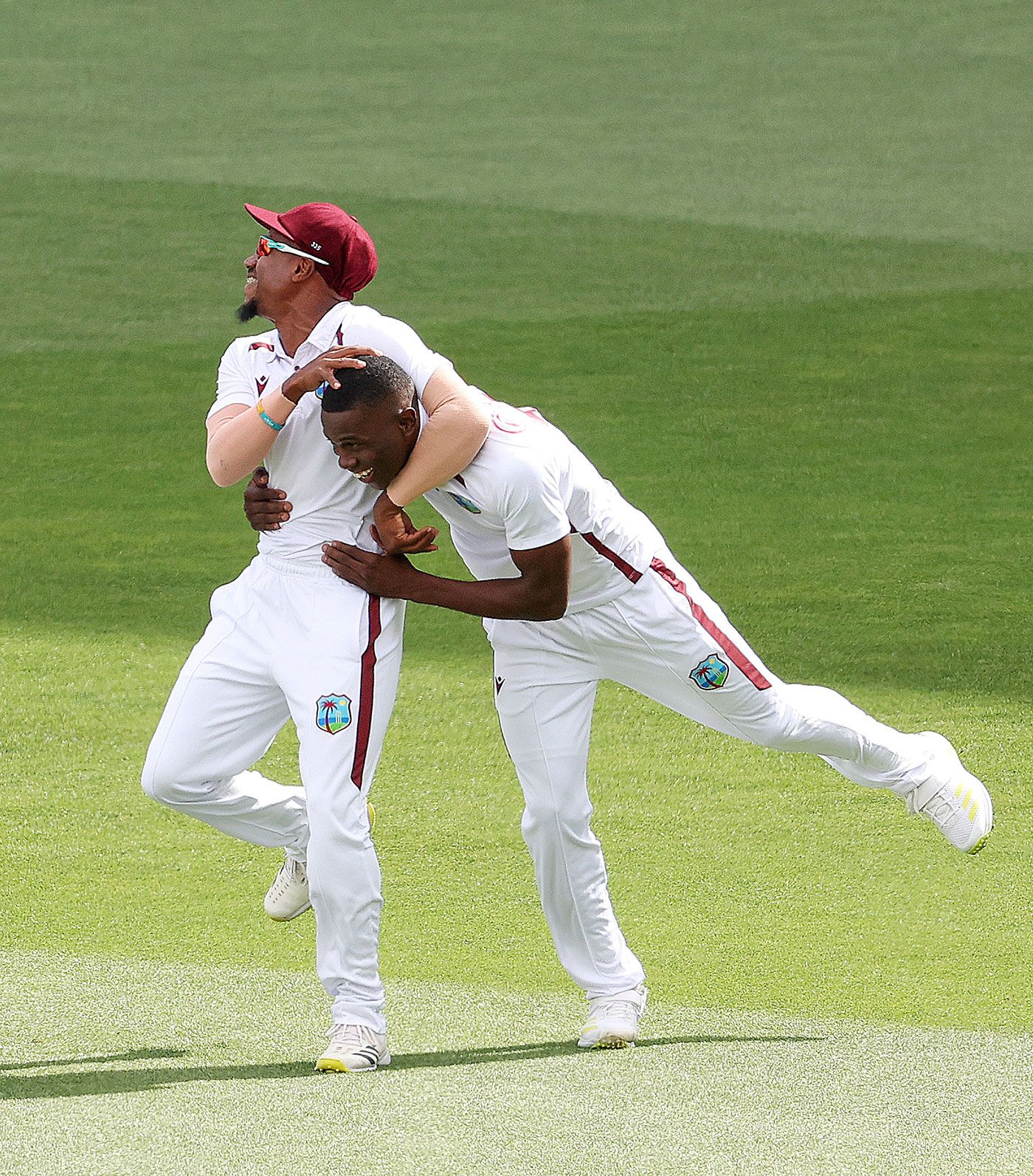 Shamar Joseph gets congratulated on his wicket of Cameron Green ...