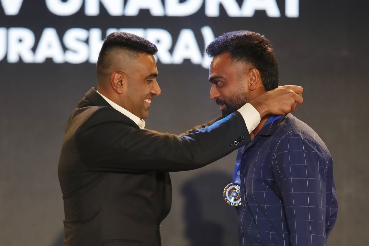 R Ashwin awards a medal to Jaydev Unadkat | ESPNcricinfo.com