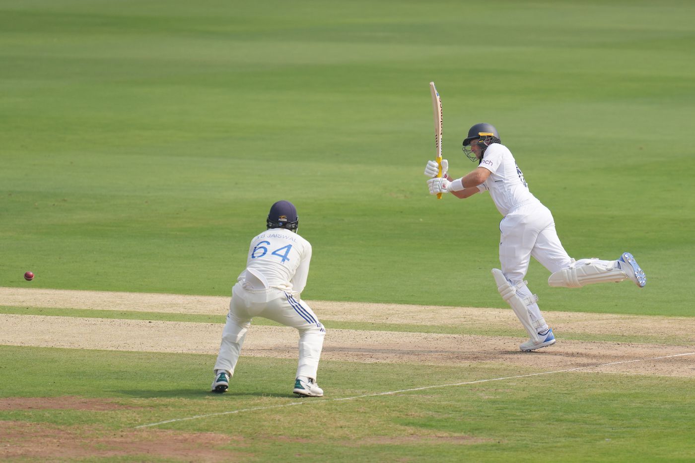 Joe Root steps out of the crease to hit through the leg side ...