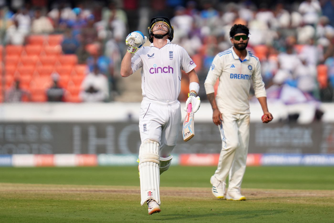 Ollie Pope looks up at the skies after getting to his century ...