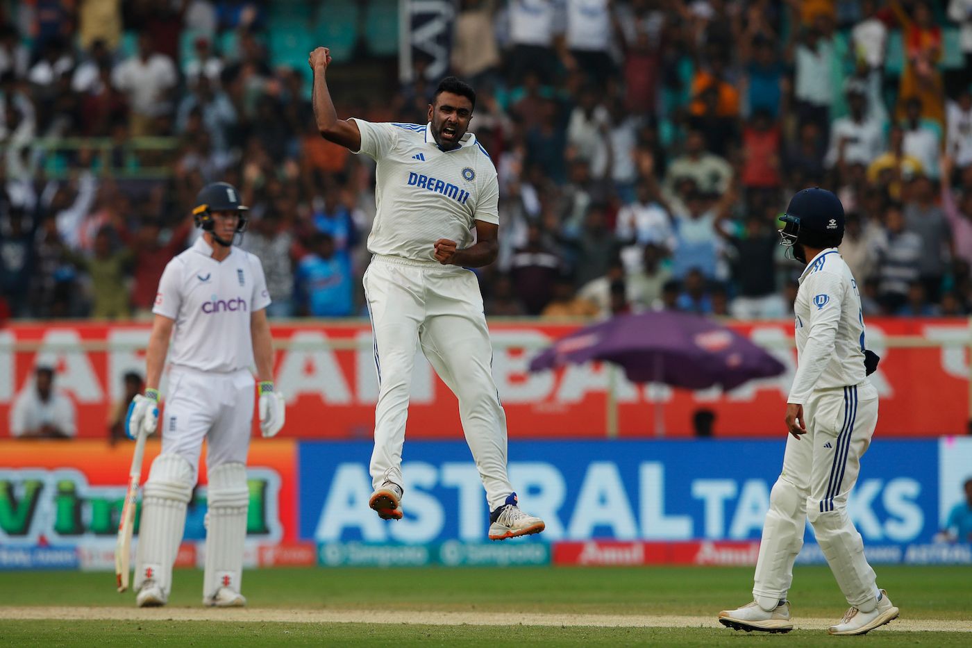 R Ashwin leaps in celebration after taking his first wicket of the Test ...