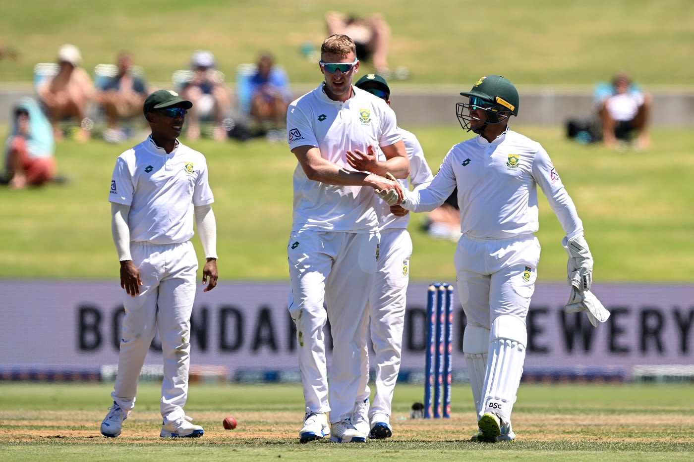 Neil Brand plucked out a superb reflex catch to remove Daryl Mitchell ...