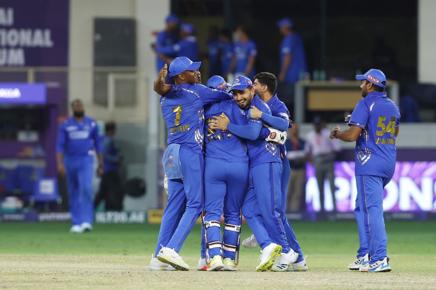 The MI Emirates players celebrate their win | ESPNcricinfo.com