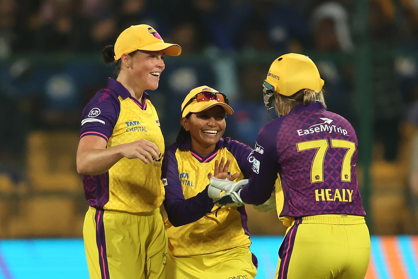 Rajeshwari Gayakwad celebrates a wicket with Grace Harris and Alyssa ...