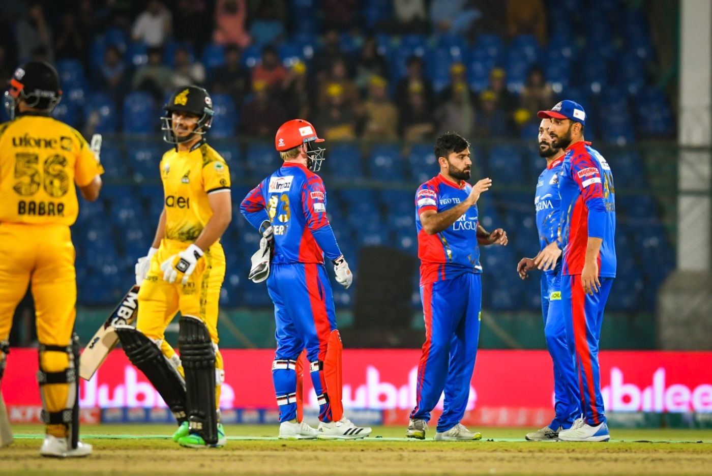 Zahid Mahmood celebrates bowling Saim Ayub with his team-mates, as the ...