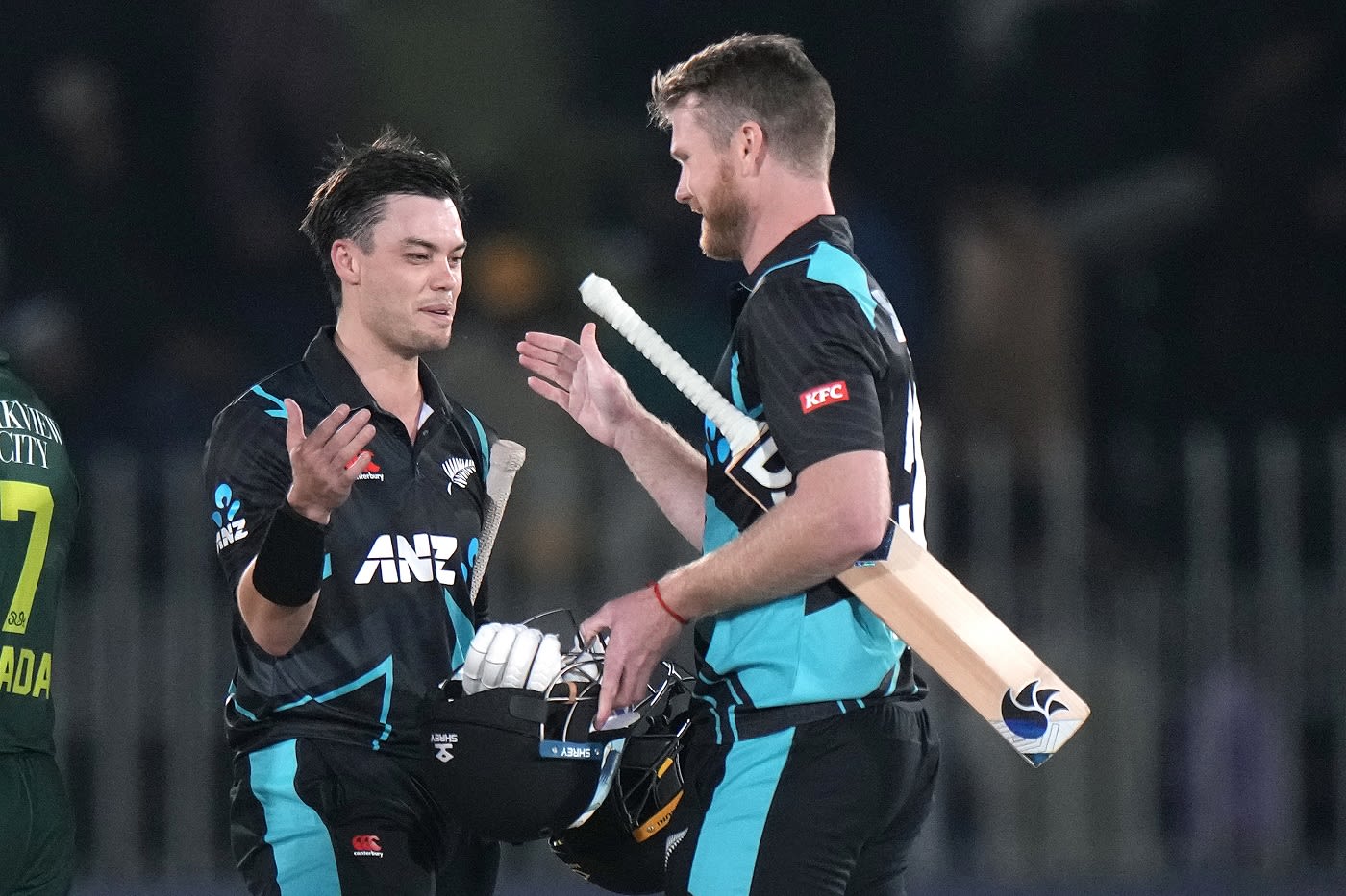 Mark Chapman and James Neesham celebrate after getting the better of Pakistan by seven wickets ...