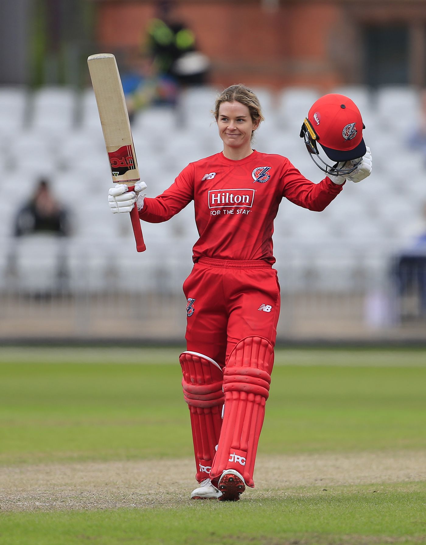 Katie Mack celebrates after reaching her century | ESPNcricinfo.com