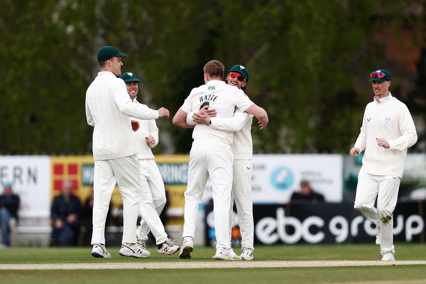 Matt Waite celebrates a breakthrough with his team-mates | ESPNcricinfo.com