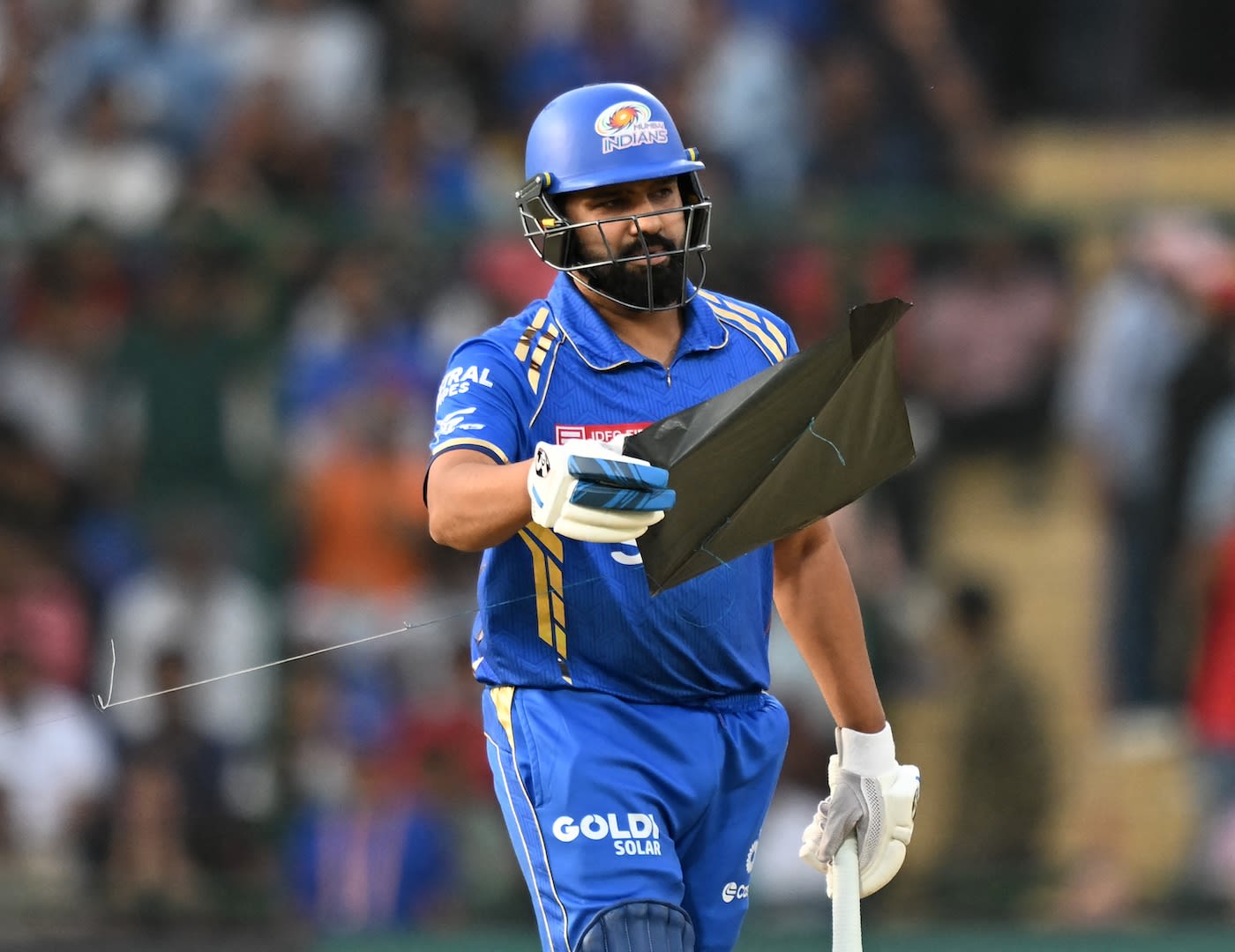 We'll do this another time - Rohit Sharma gets a stray kite out of his way | ESPNcricinfo.com