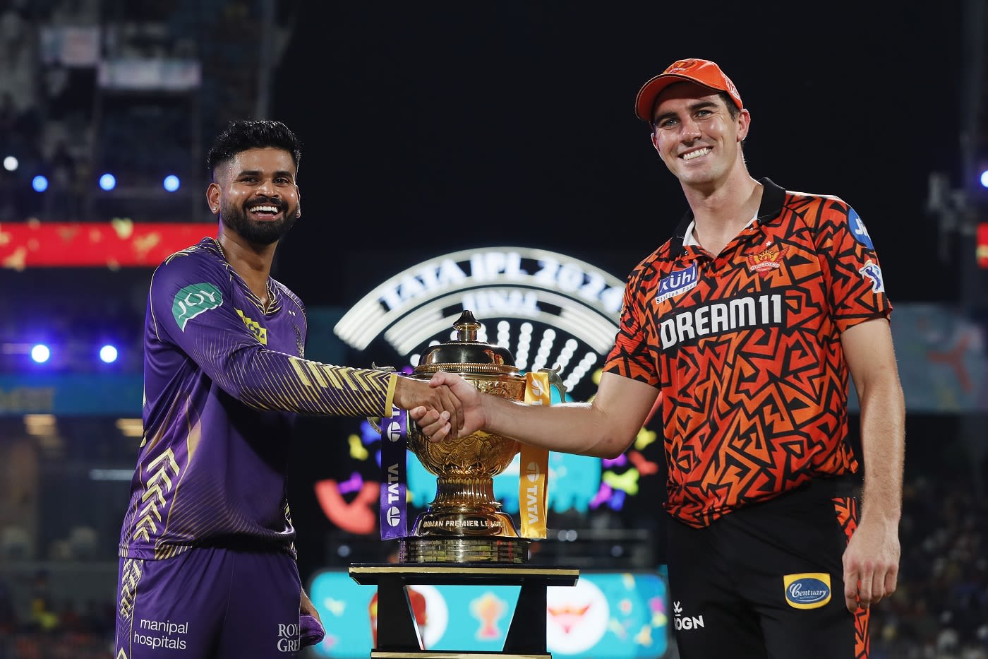 Shreyas Iyer and Pat Cummins pose in front of the IPL trophy ...