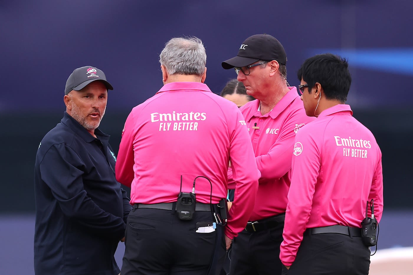 The umpires and ground officials have a conference | ESPNcricinfo.com