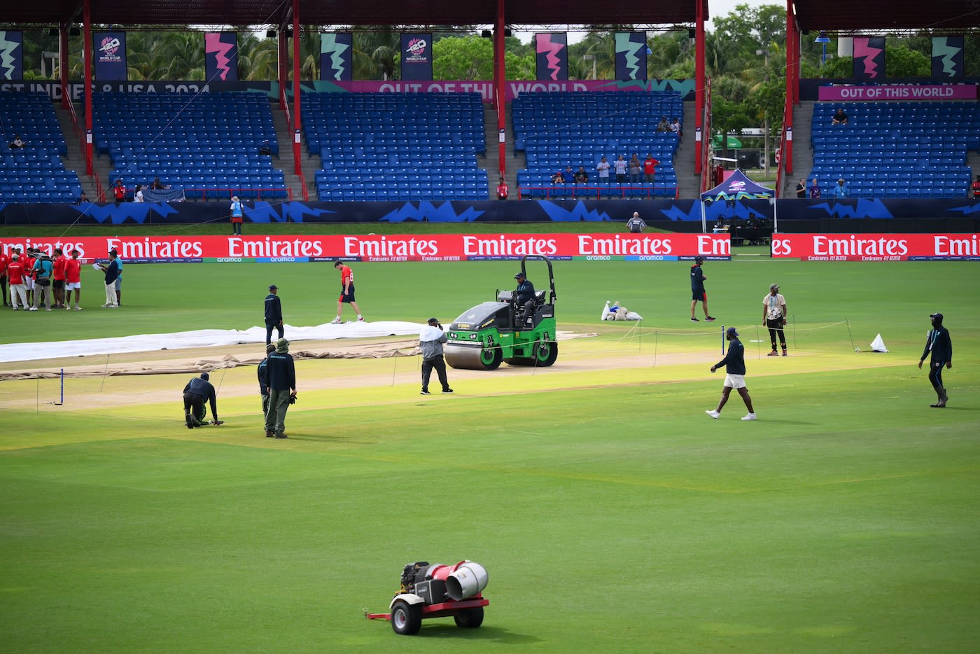 Frenetic activity as groundspersons try to get it match-ready ...